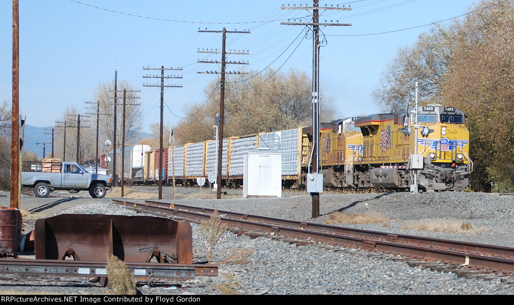 UP 7405 leads an east bound UP freight across Baker Valley